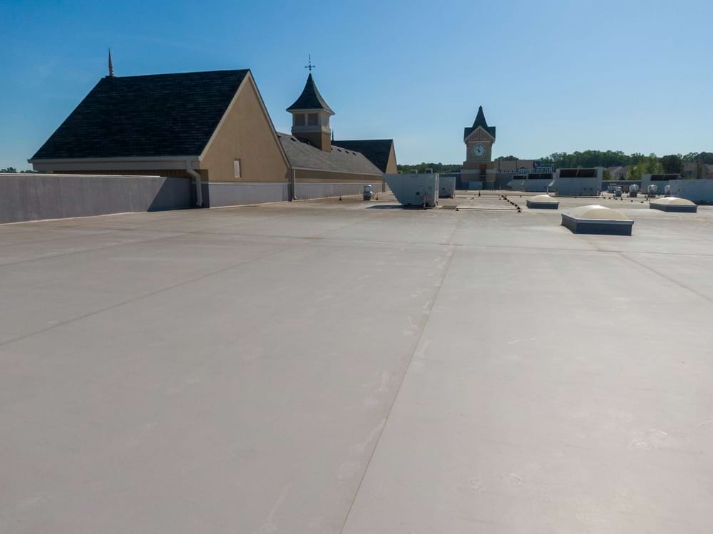 Commercial Flat Roof Replacement: Complete Guide to Systems & Timeline